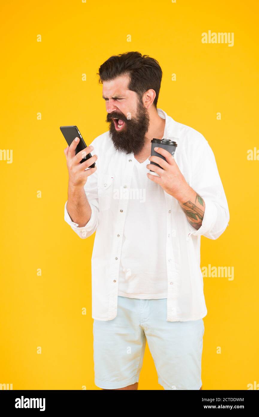 angry mature bearded man shouting and screaming emotionally on phone ...