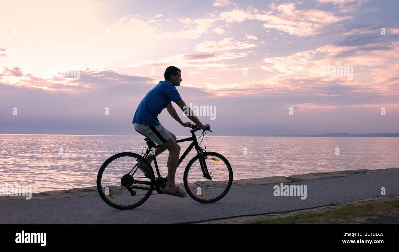 Thief stealing bike hi-res stock photography and images - Alamy