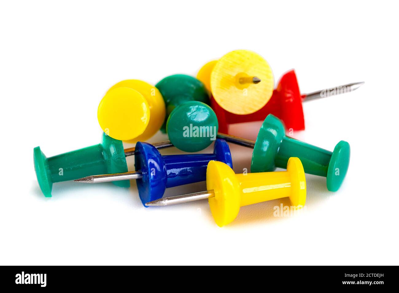 Closeup of Many Colored Thumbtacks on White Stock Photo - Alamy