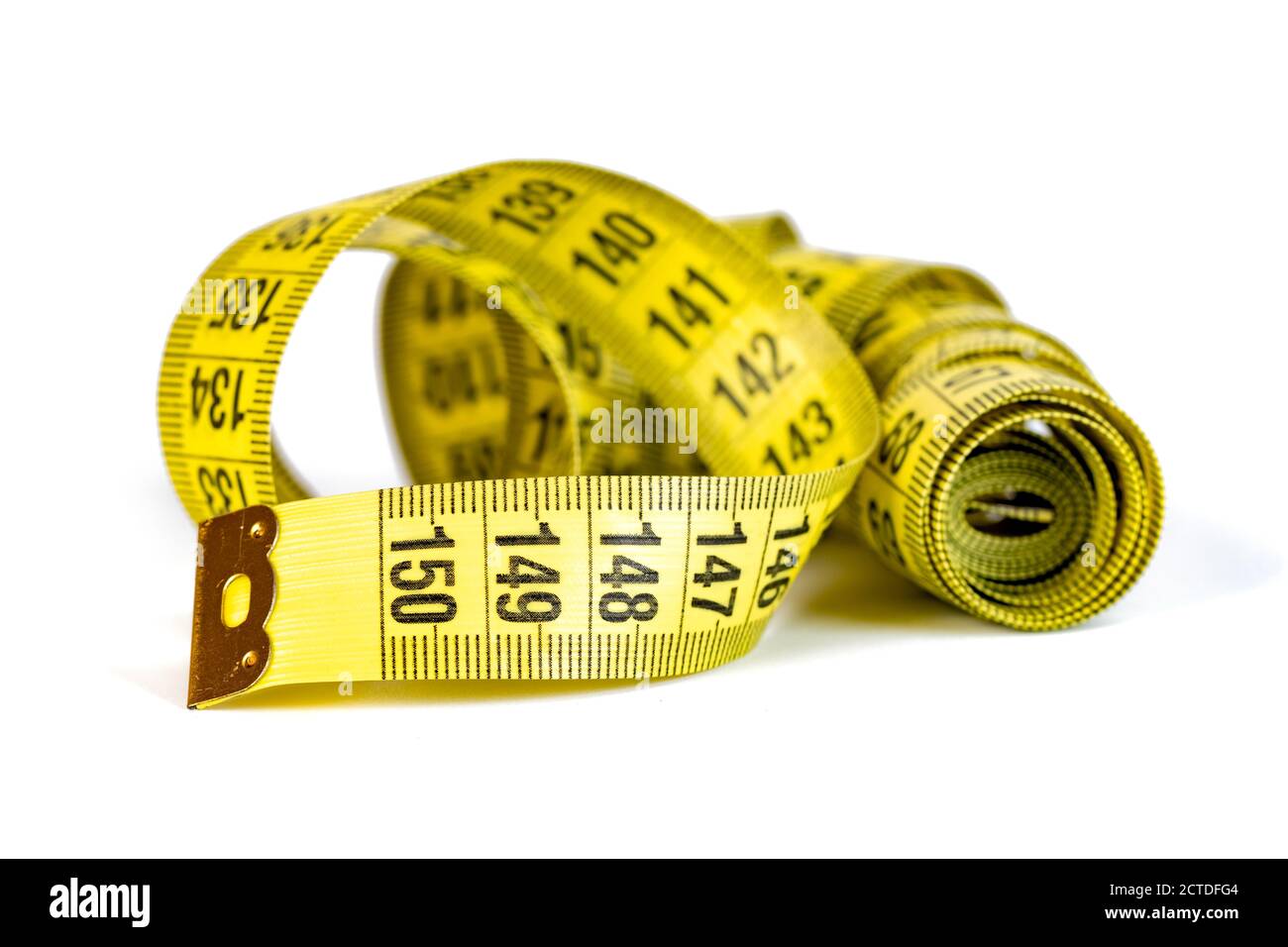 Yellow measuring tape isolated on white background Stock Photo - Alamy