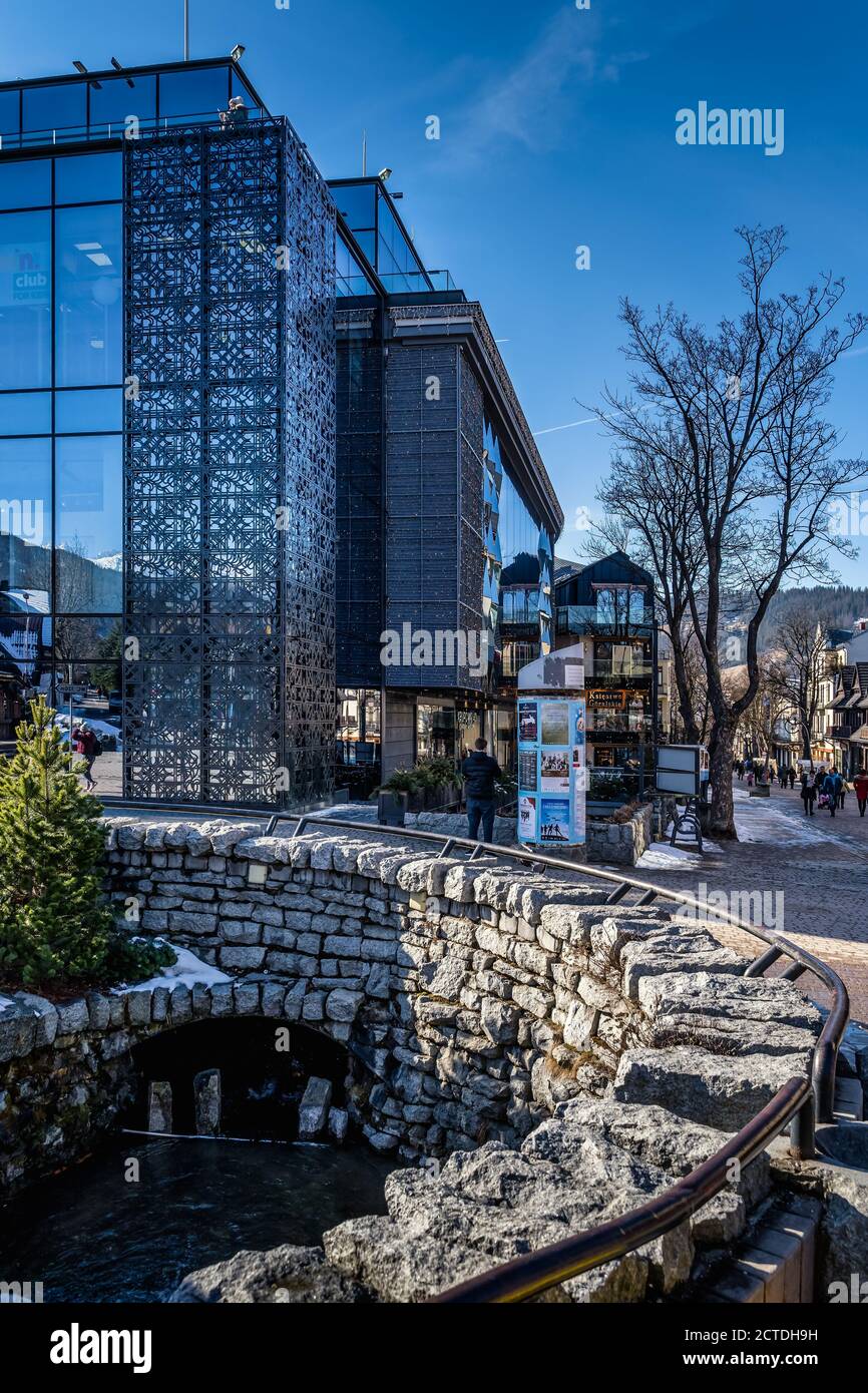 Zakopane, Poland, March 2019 Famous Krupowki promenade, main shopping ...