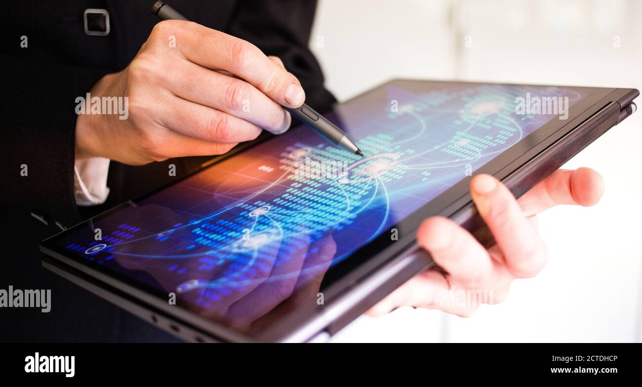 hand touching tablet screen global connection Stock Photo - Alamy