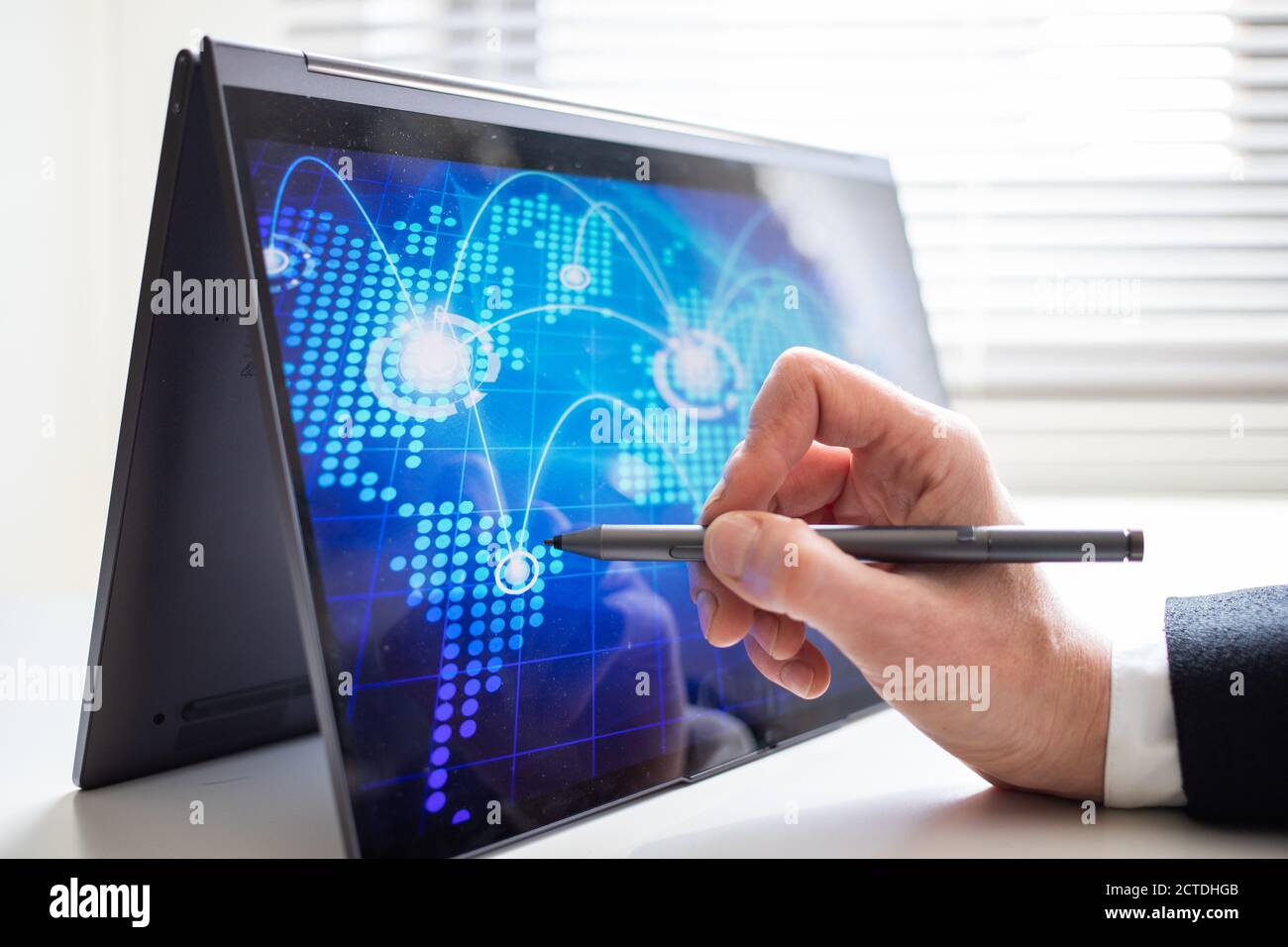 Hand touching tablet screen hi-res stock photography and images - Alamy