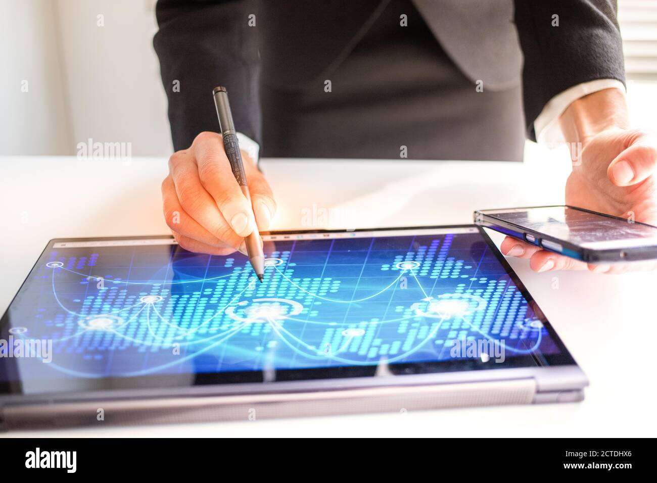 hand touching tablet screen global connection Stock Photo - Alamy