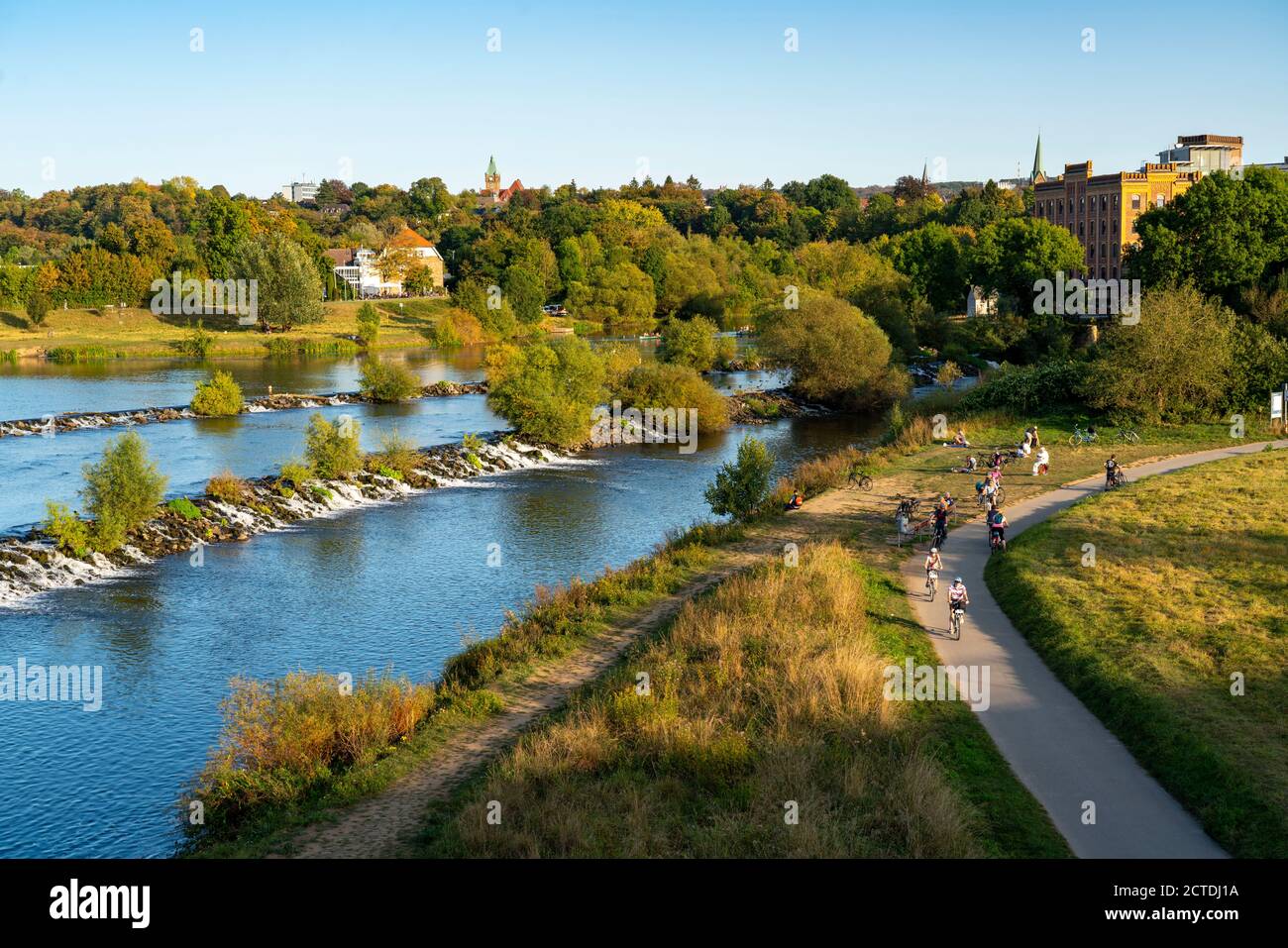 The Ruhrwehr, barrage of the Ruhr river, near Hattingen, cyclist, on ...