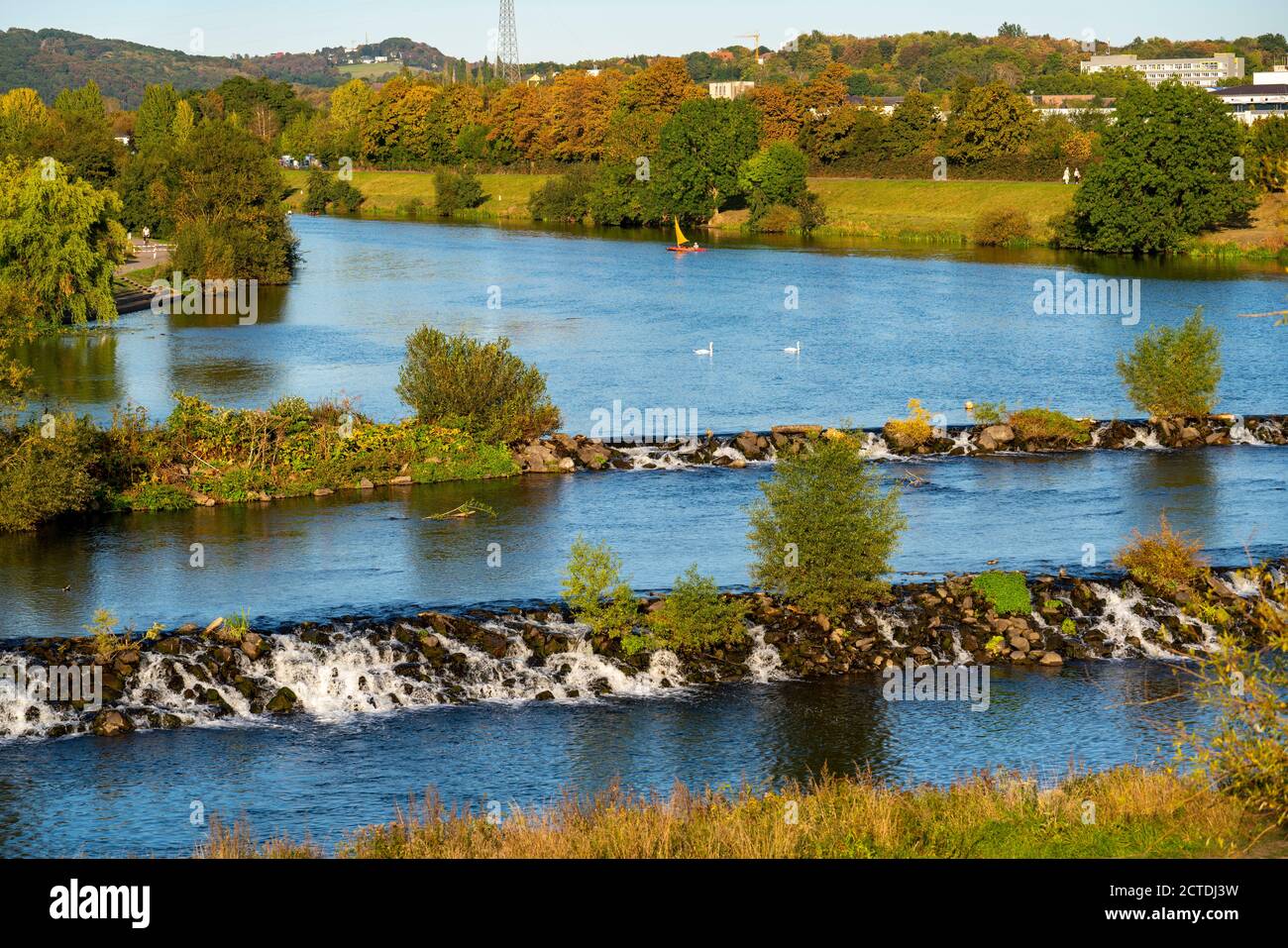 The Ruhrwehr, barrage of the Ruhr river, near Hattingen, cyclist, on ...