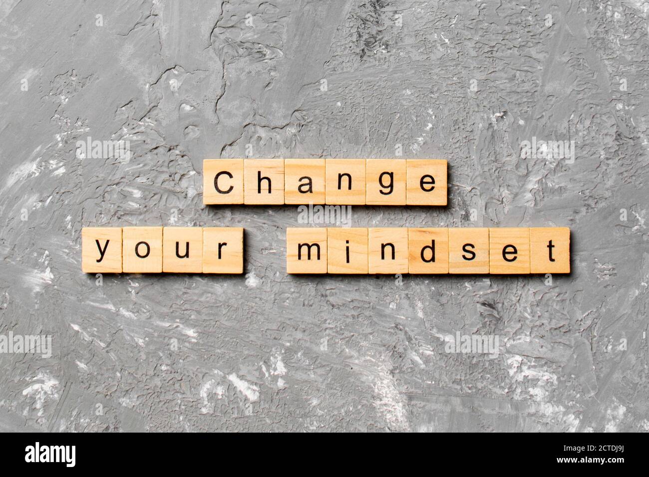Change your mindset word written on wood block. Change your mindset ...