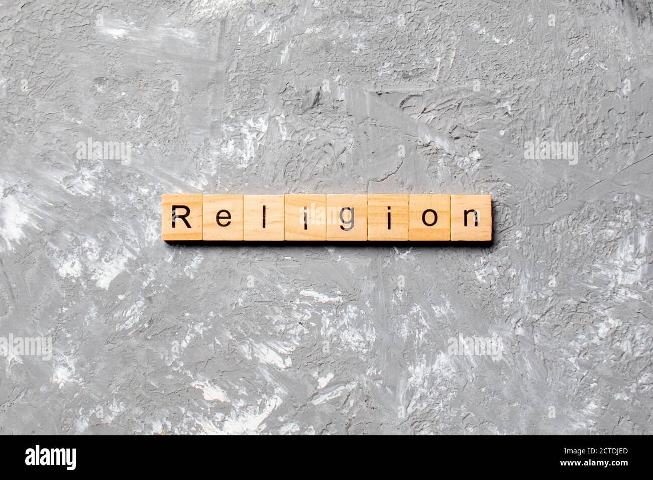 Religion word written on wood block. Religion text on cement table for ...
