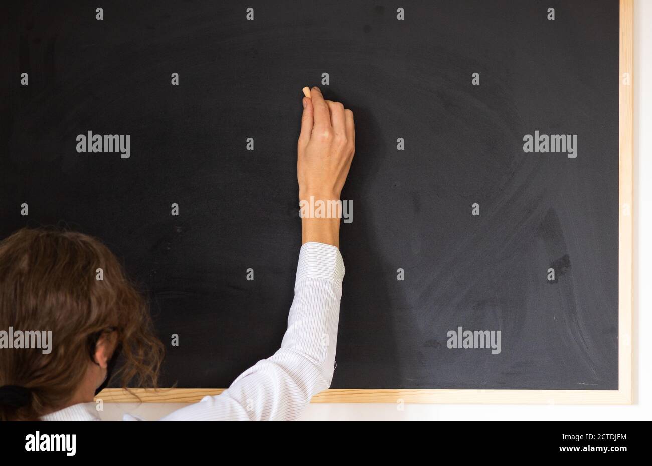 hand writing on blackboard Stock Photo - Alamy