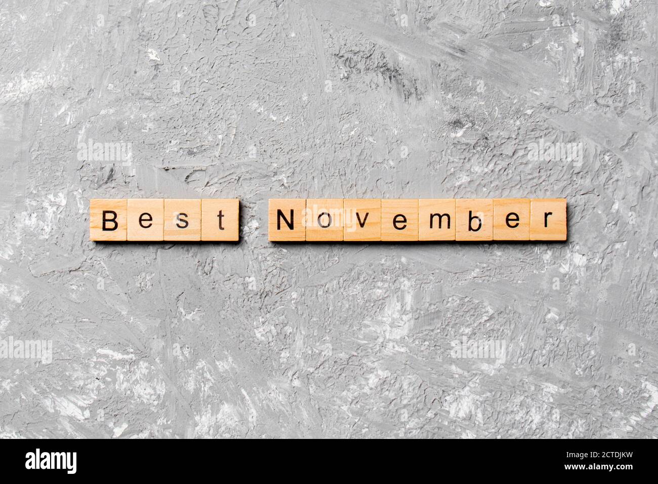 best november word written on wood block. best november text on table ...