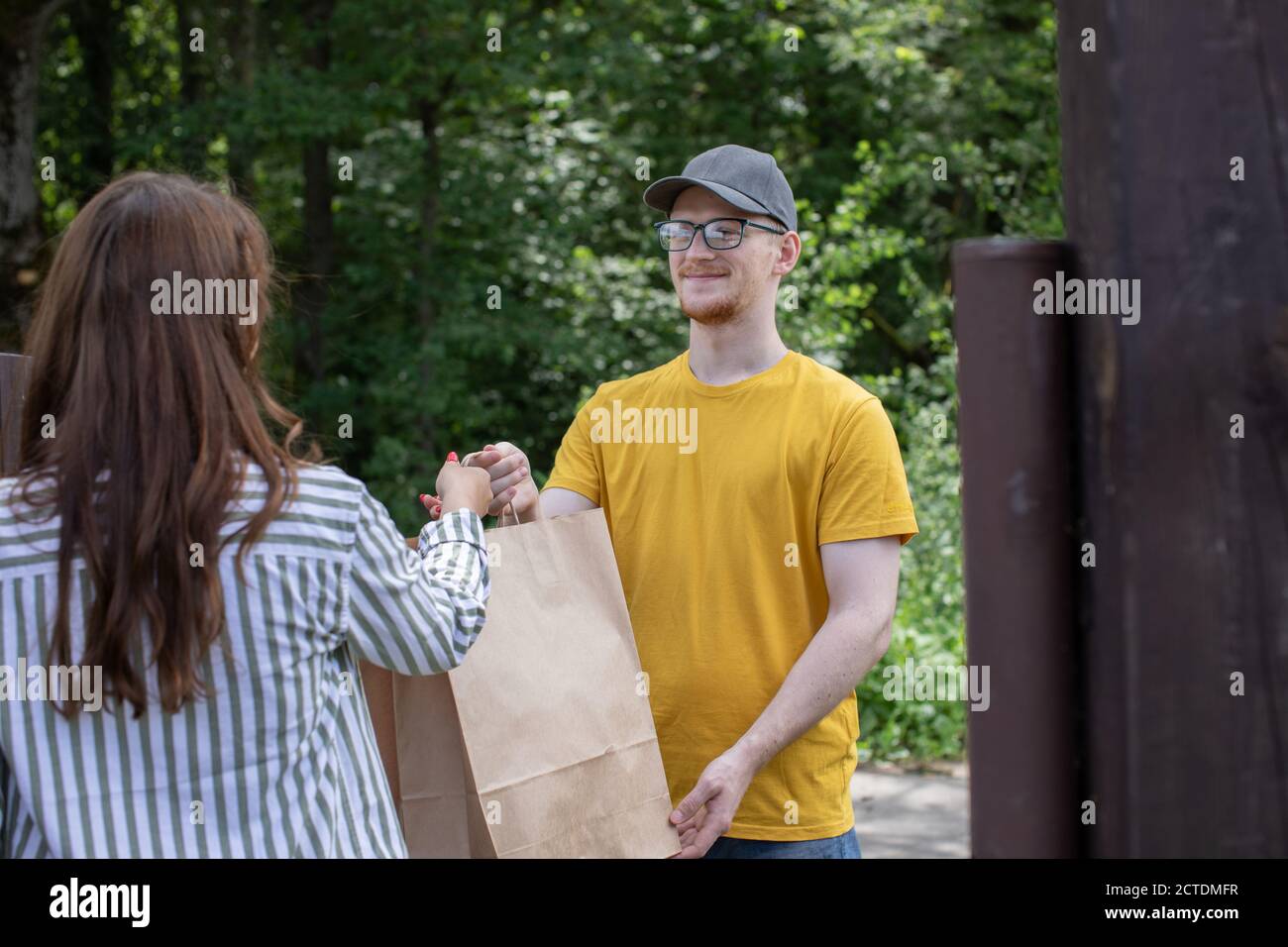 Handing bags hi-res stock photography and images - Alamy