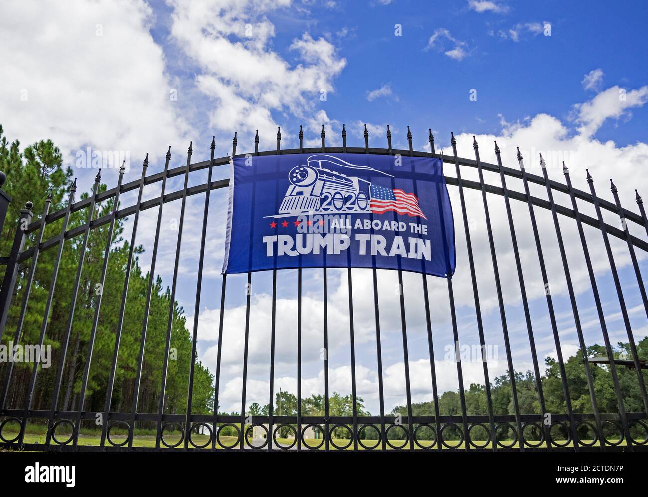 Trump Train Banner adorns a fence gate in rural North Florida Stock ...