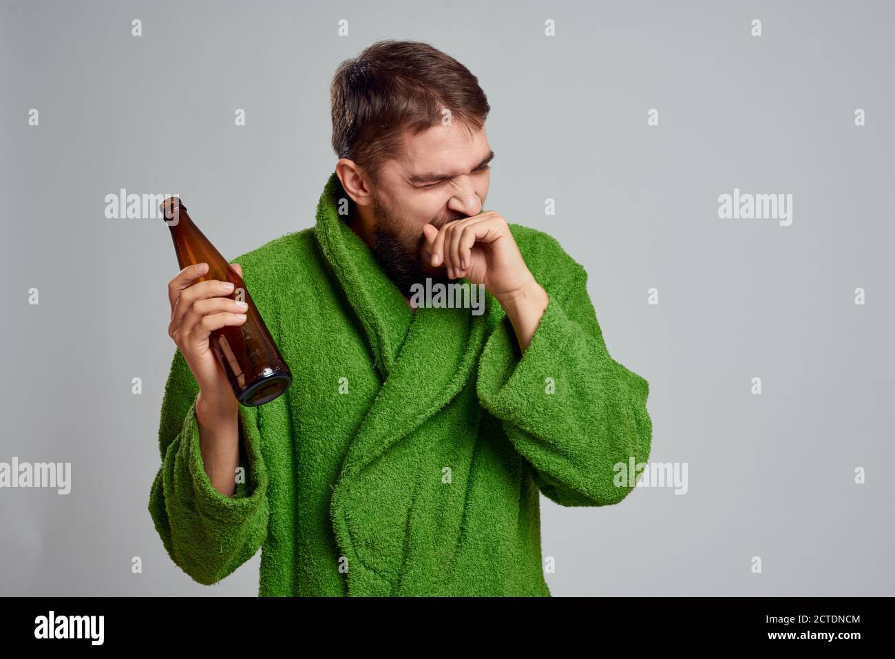 Caucasian man in robe drinking hi-res stock photography and images - Alamy