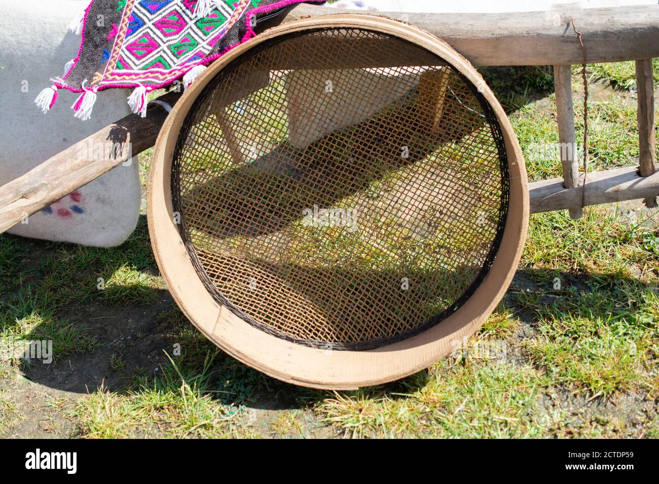 Traditional type sieve made of wood Stock Photo - Alamy