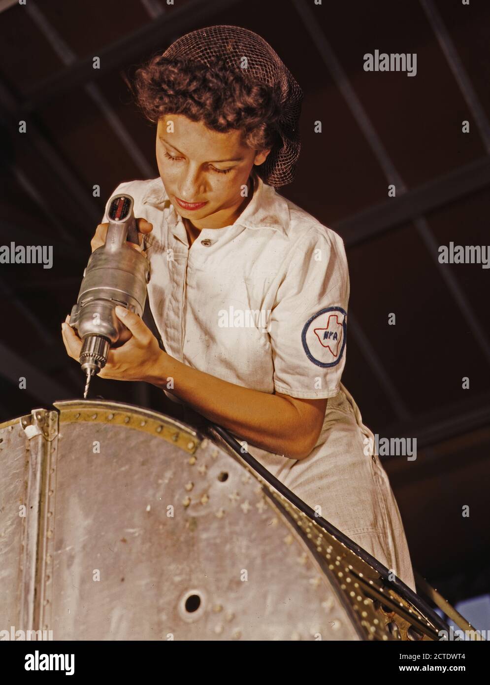 A rivet is her fighting weapon. this female worker, daughter of a Navy ...