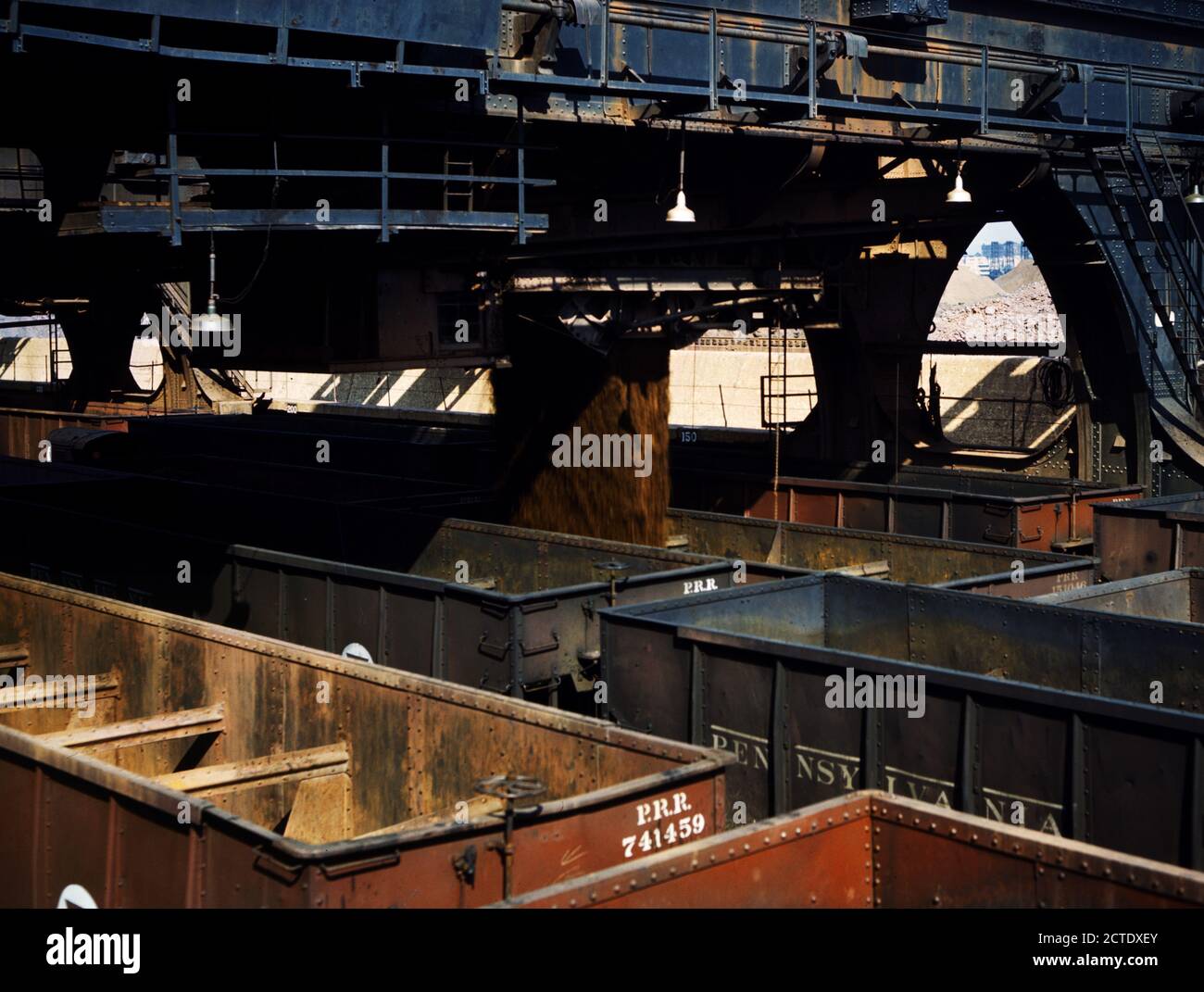 After the ore is weighed in the "Hewlett" [i.e. "Hulett"] machine it is ...