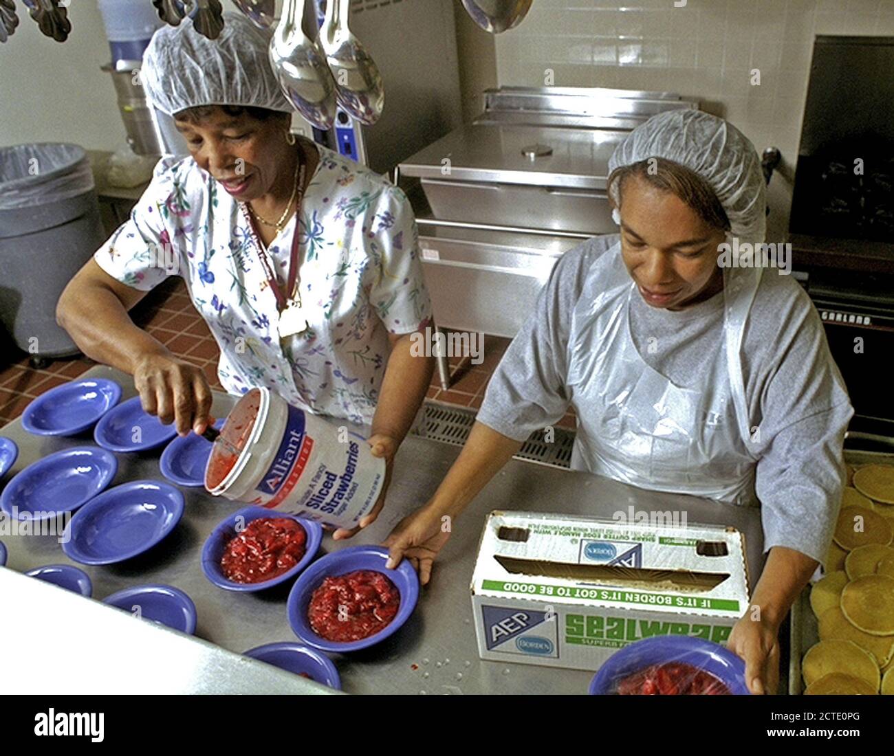 August 1999 - Food Service Personnel At Work Stock Photo - Alamy