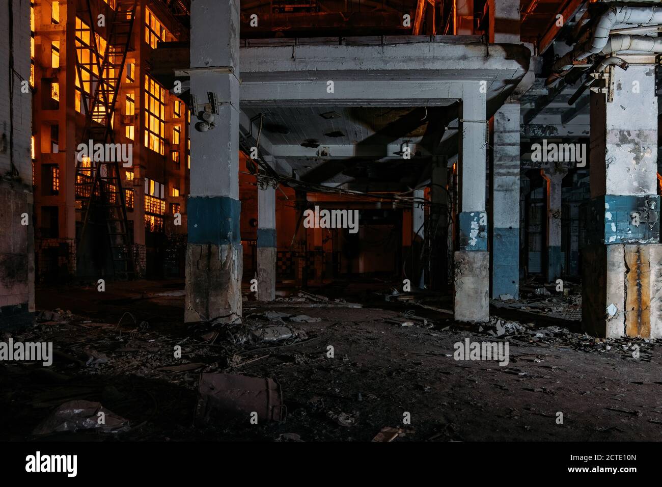 Dark creepy empty abandoned industrial building interior at night Stock ...