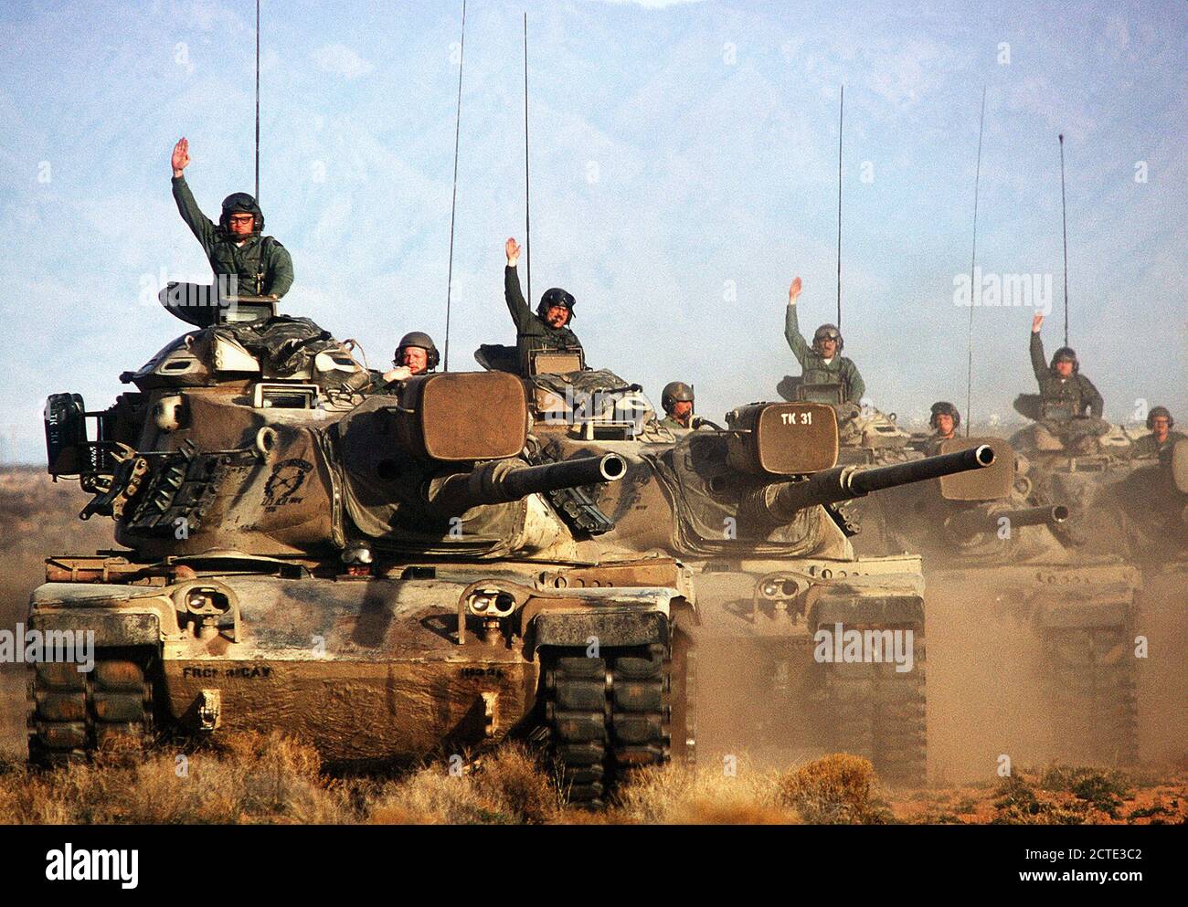 1977 - A convoy of M-60 main battle tanks move out during a training ...