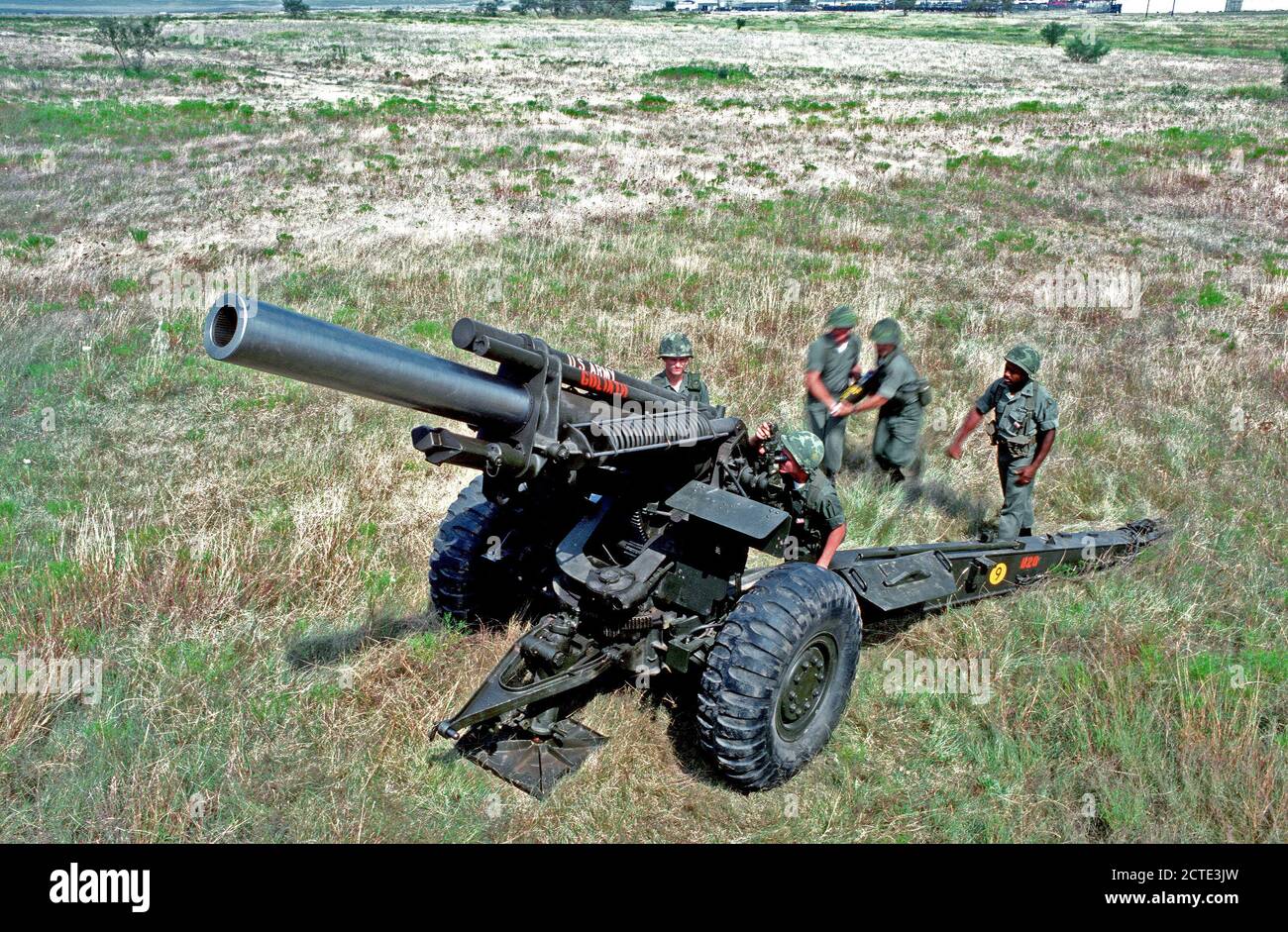 1975 - Artillerymen prepare to load an M114A1 155 mm howitzer during a ...