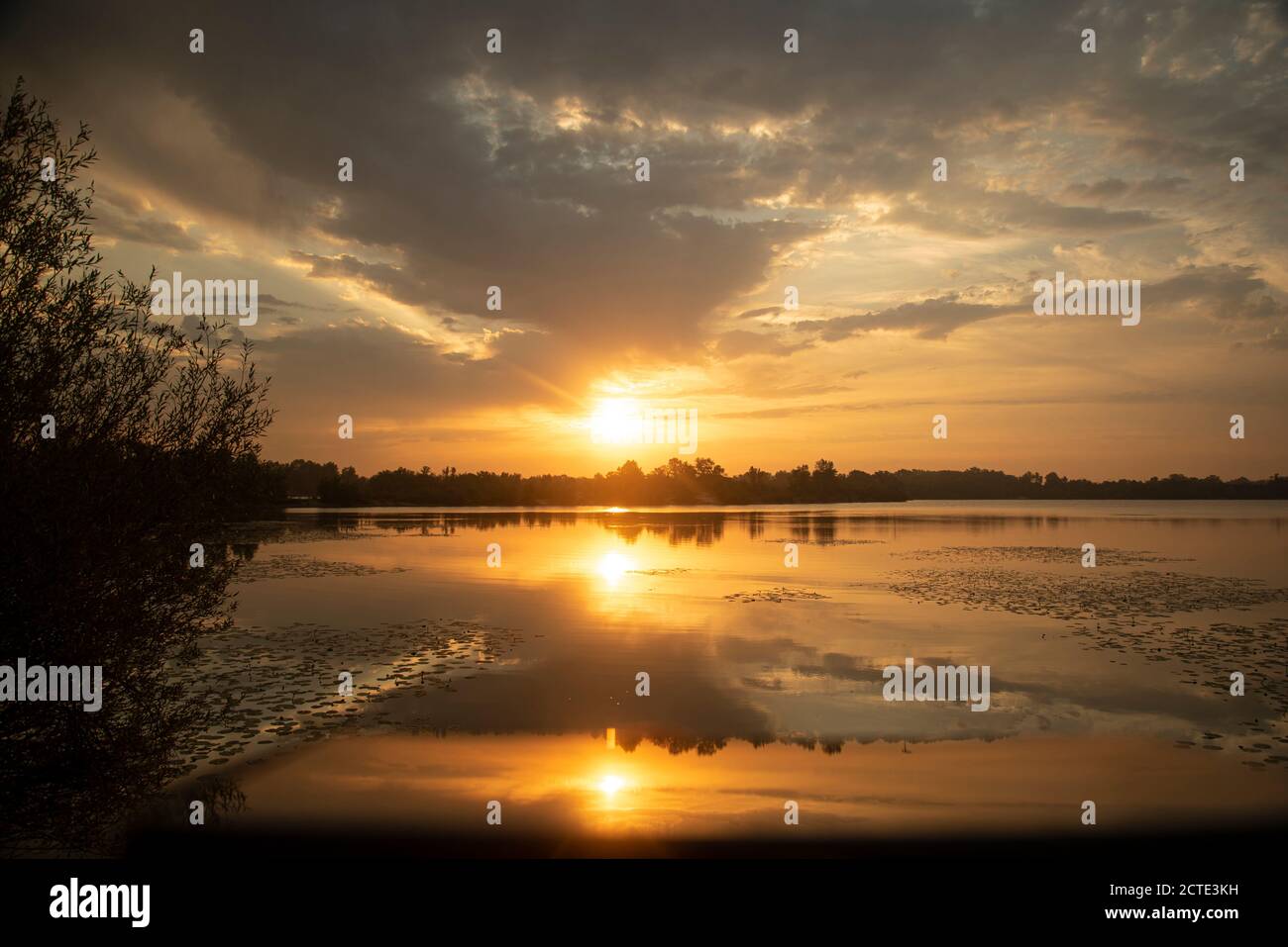Beautiful sunrise on lake morning Reflection Stock Photo - Alamy
