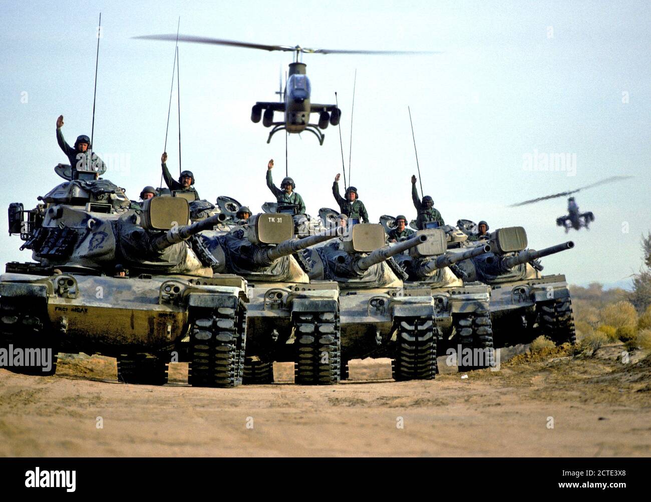 1974 - US Army soldiers give hand signals from M60 main battle tanks ...