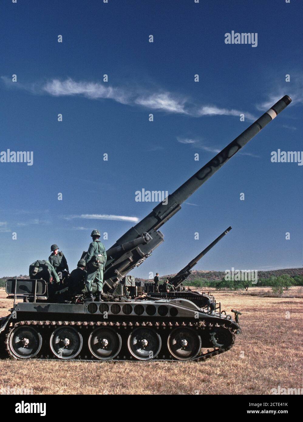 1975 - Ammunition is loaded into M107 175 mm self-propelled howitzers ...