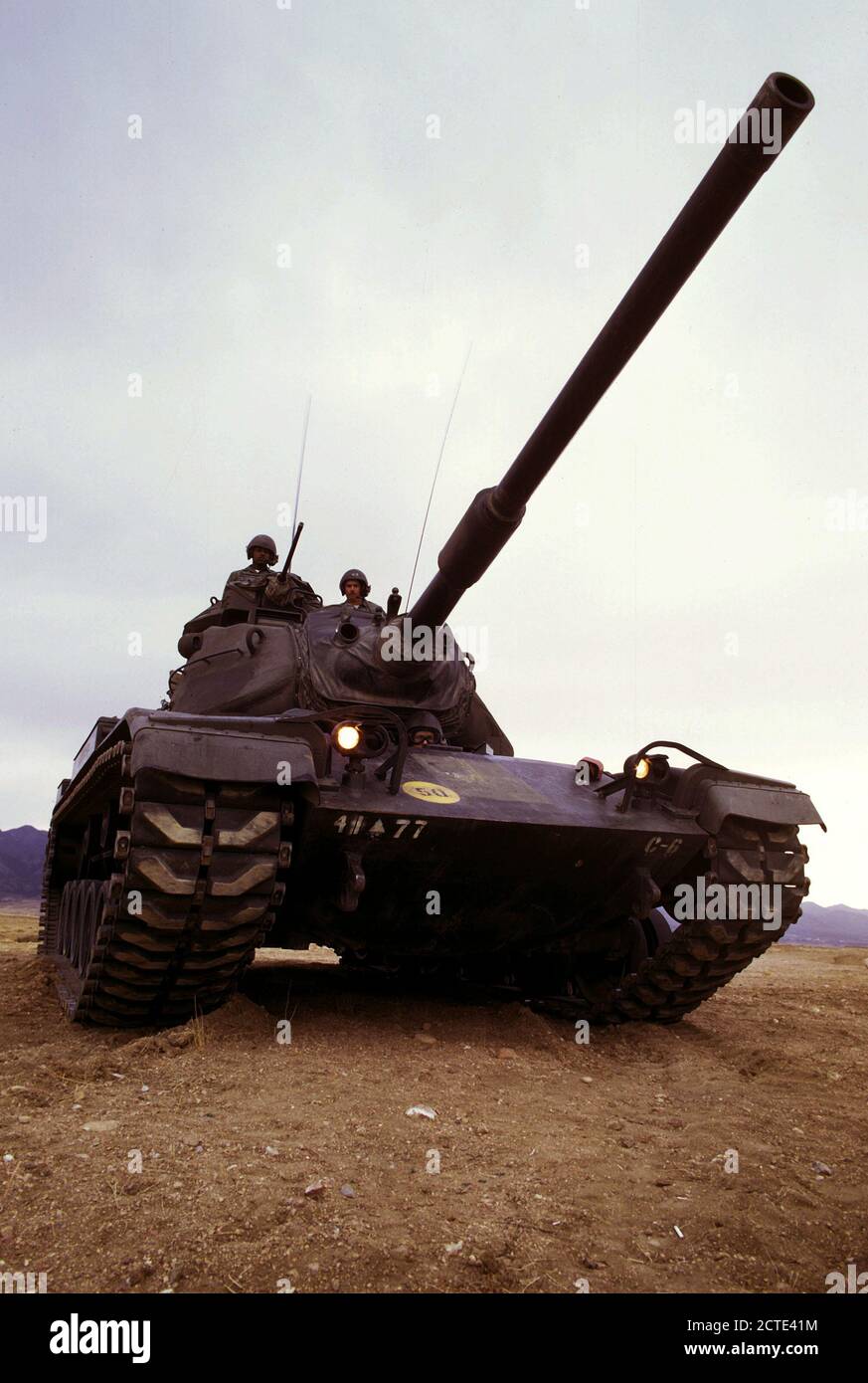 1974 - A US Army tank crew mans an M60 main battle tank during a field ...
