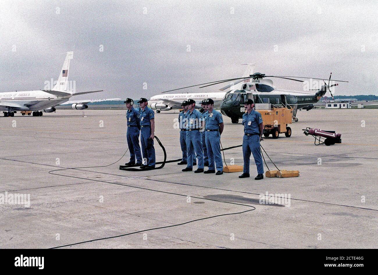 1980 - An aircraft maintenance crew stands by as President Jimmy Carter ...