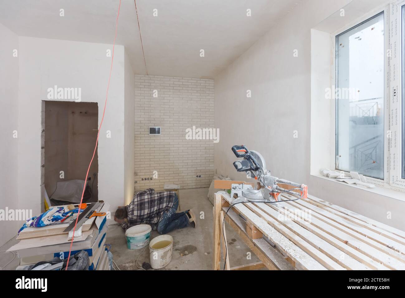 Repair in the house. Wooden table for repair, plastering and painting ...