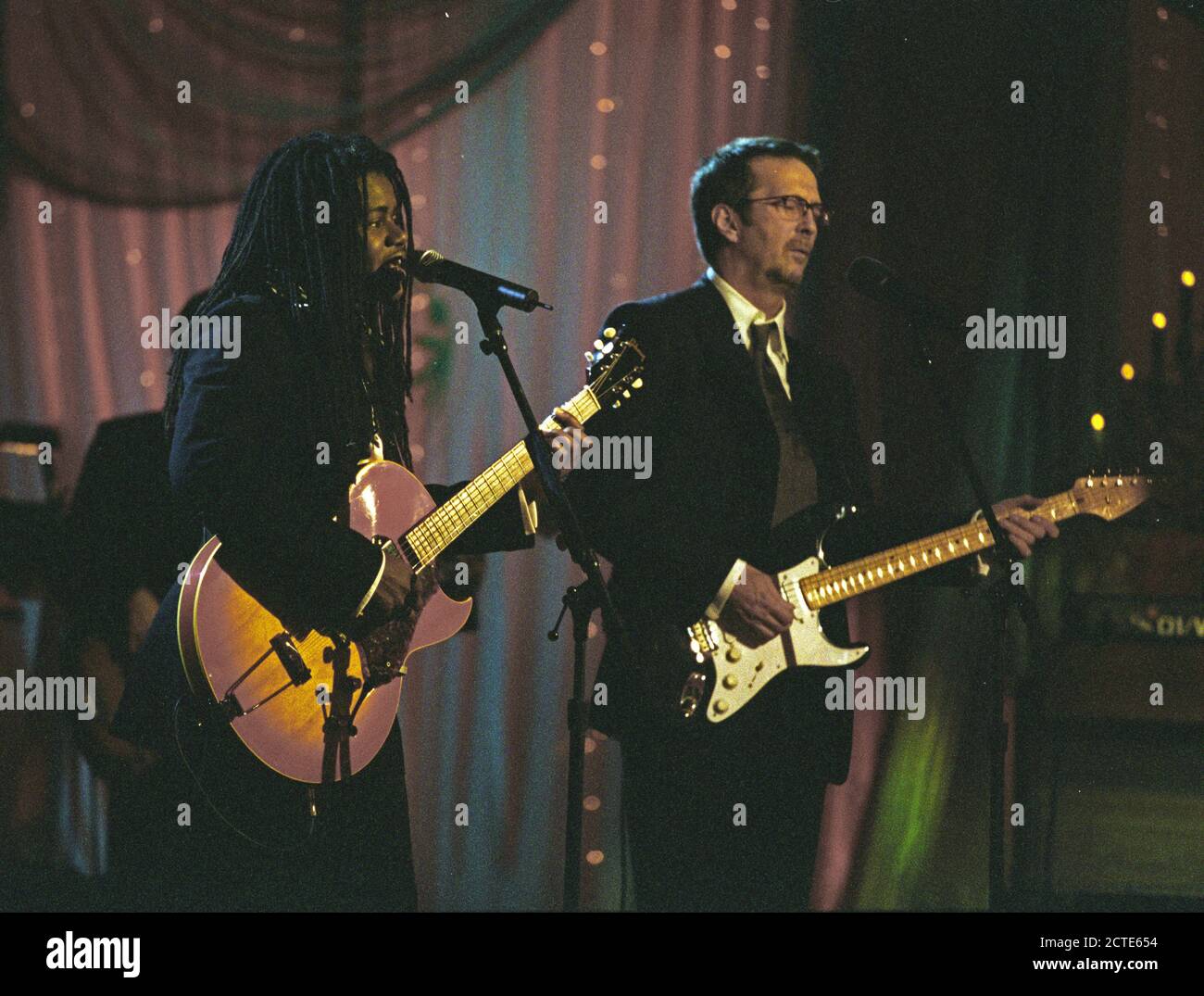 12/17/1998 - Photograph of Tracy Chapman and Eric Clapton Performing at ...