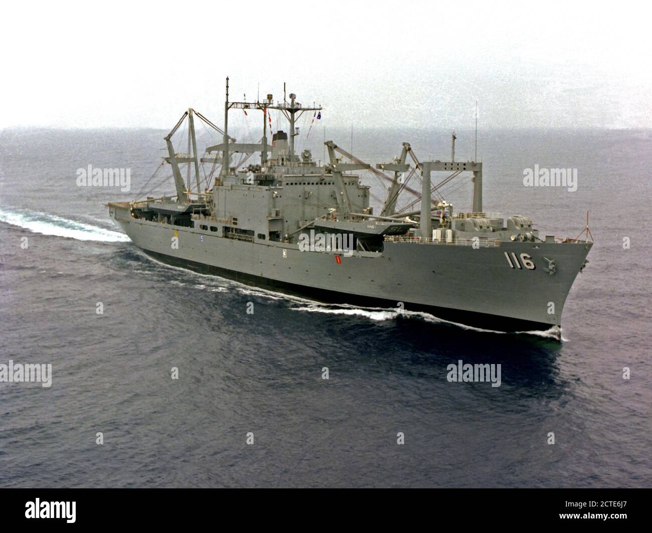 1976 - An aerial starboard bow view of the amphibious cargo ship USS ST ...