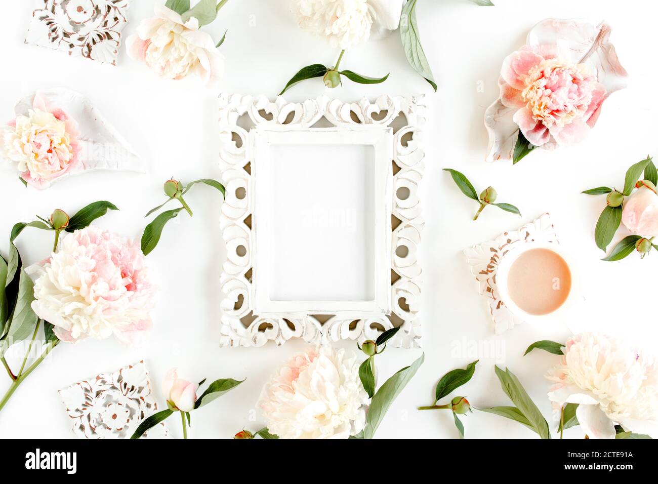 Carved, white frame decorated of beautiful pink peonies on white ...