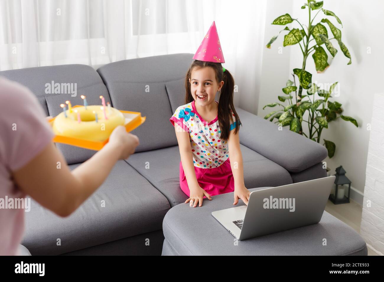 Children virtual birthday party with cake online together with her ...