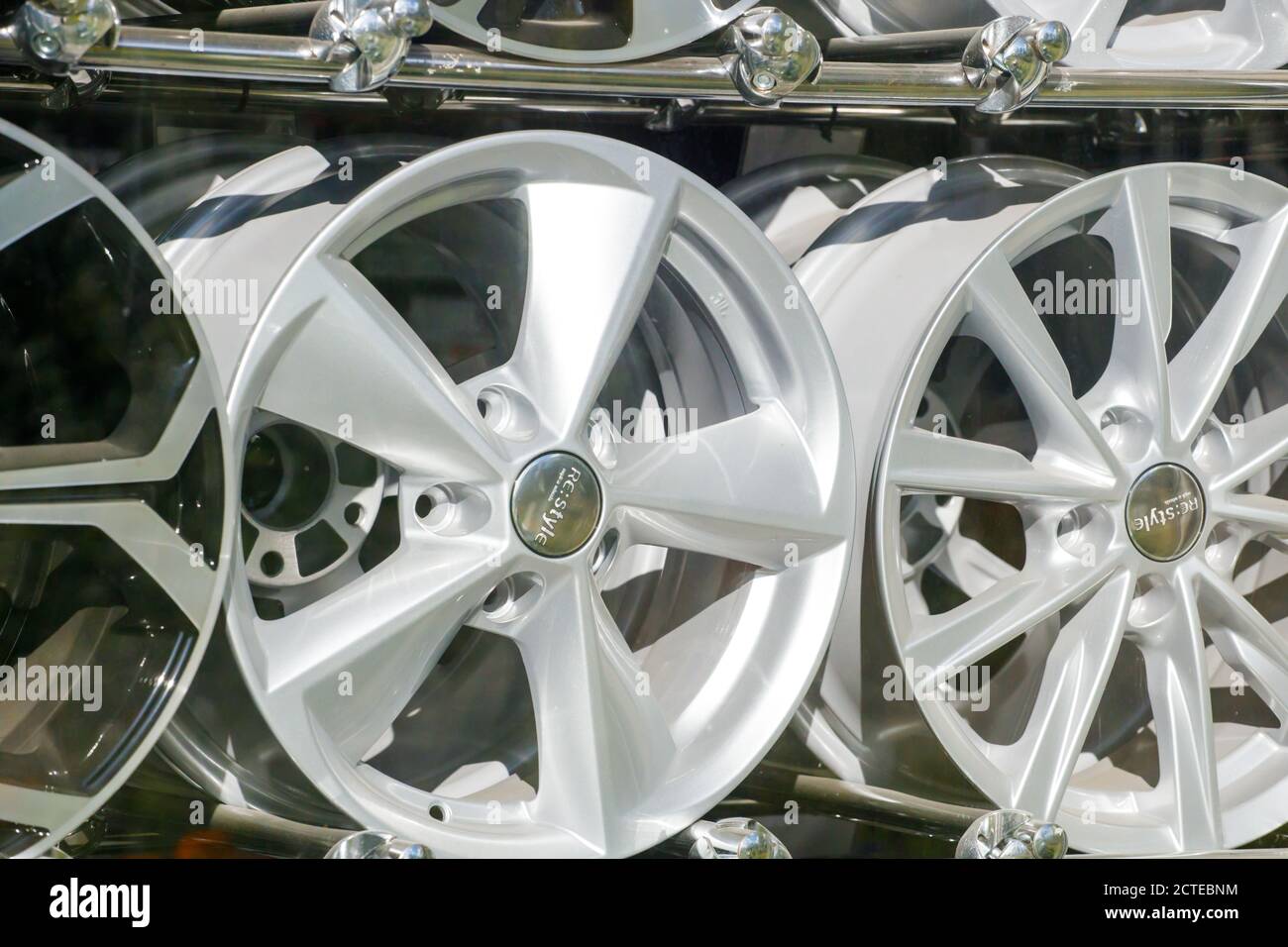 Russia Vyborg. 09.09.2020 Car rims in the shop window behind the glass ...