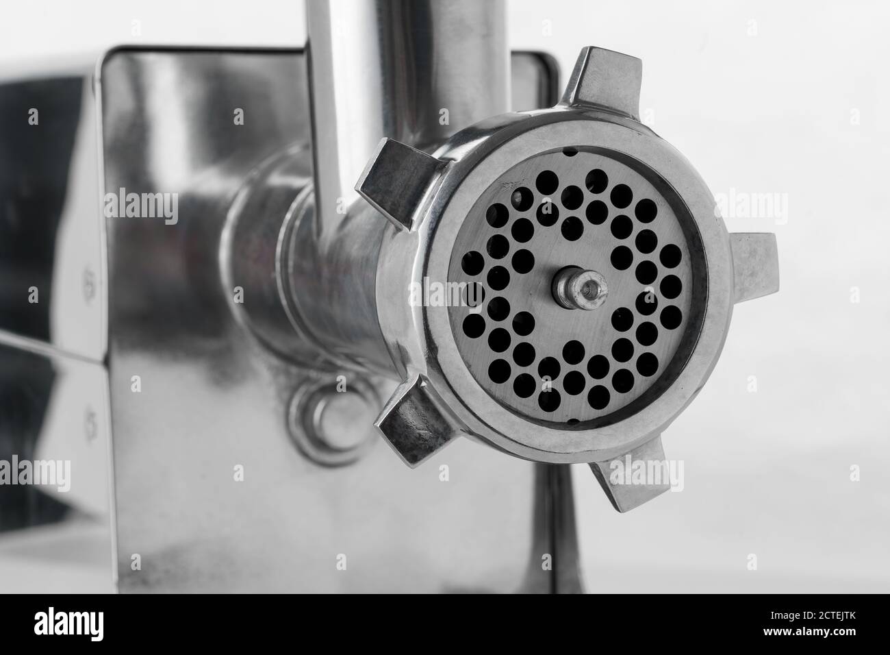 Metal meat grinder isolated on white background Stock Photo - Alamy