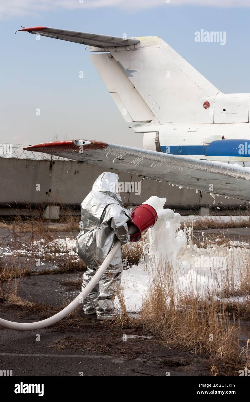 Fill the plane with fire-fighting foam after emergency landing Stock ...
