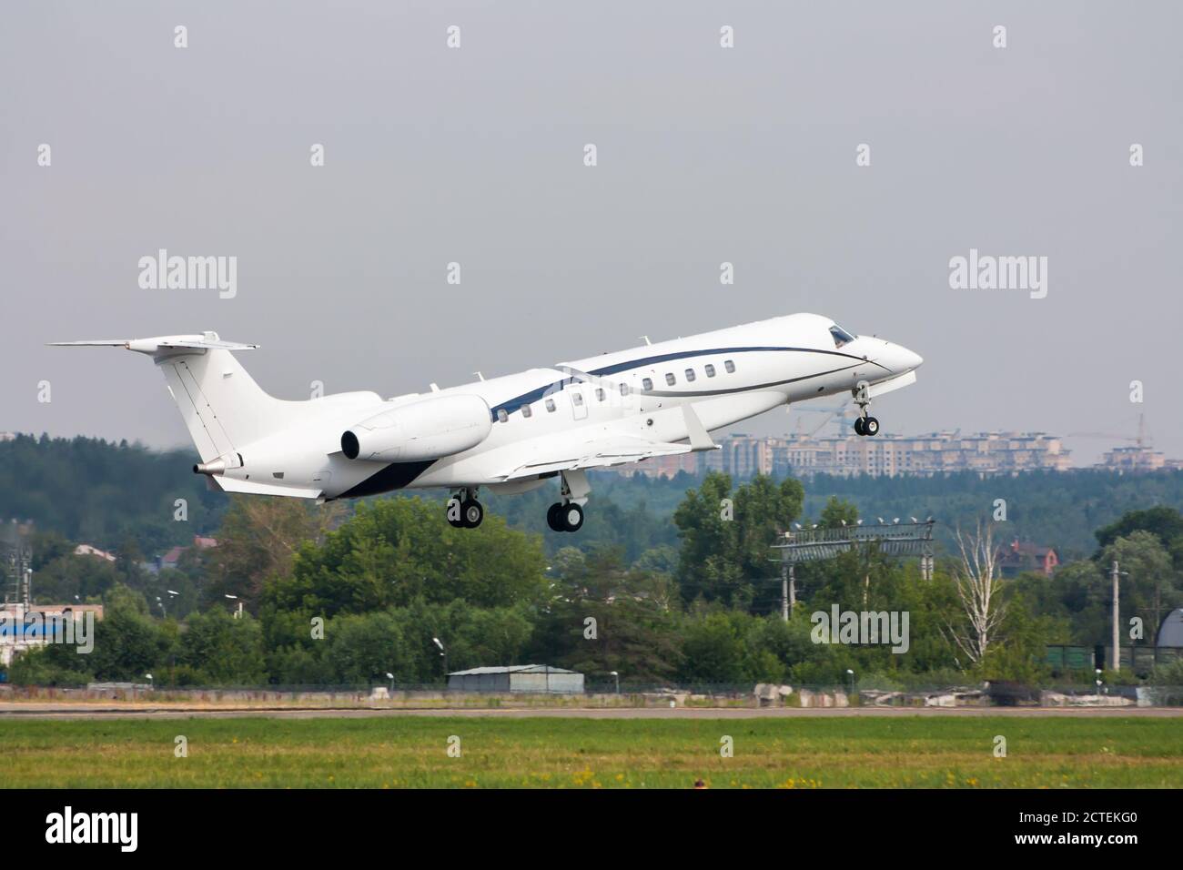 Business jet taking off Stock Photo - Alamy