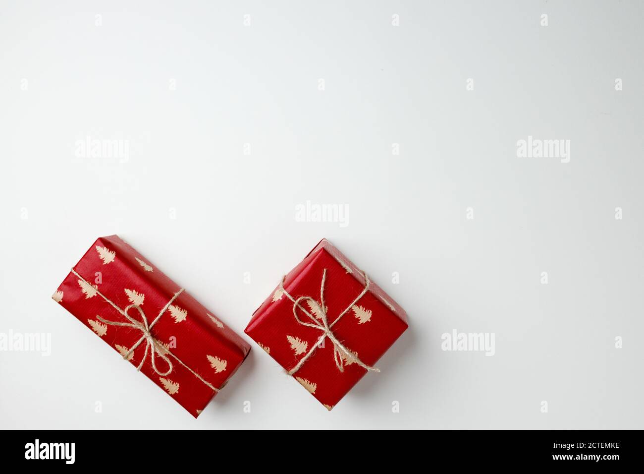 Red gift boxes on white background top view Stock Photo - Alamy