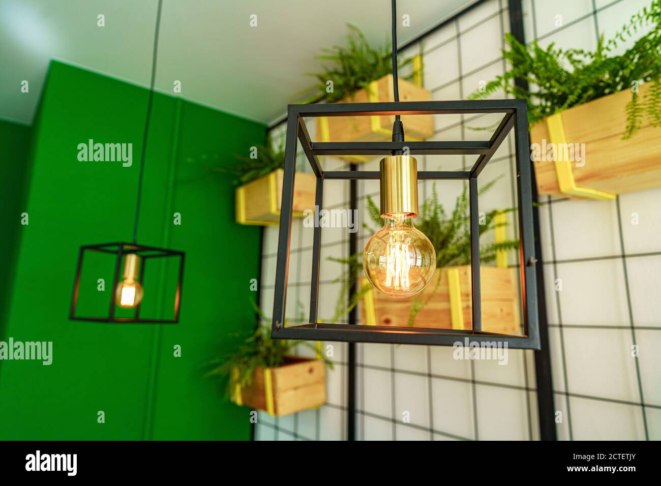 Creative loft style lamp with shining lightbulb Stock Photo - Alamy