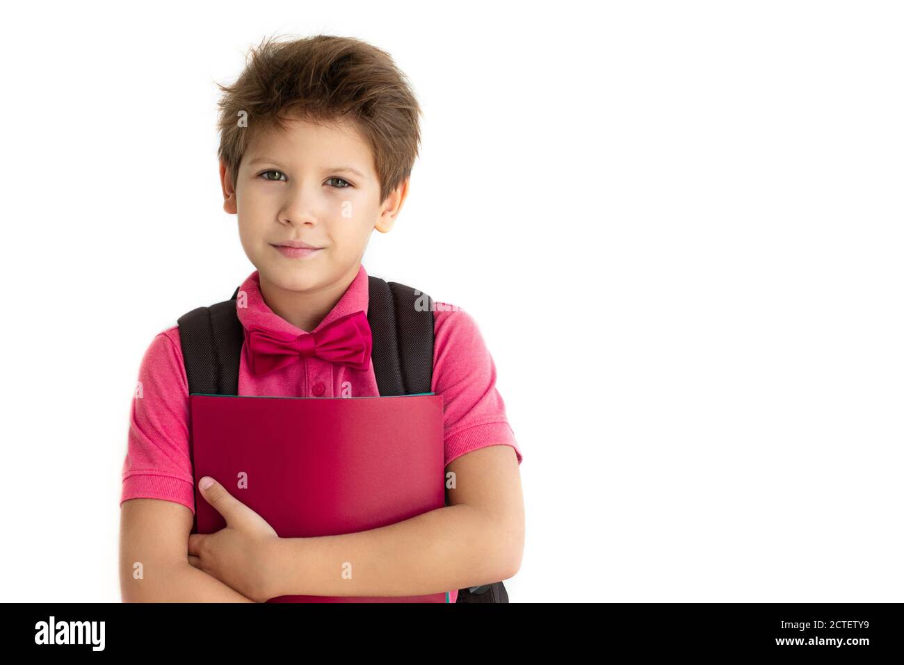 Schoolboy with smiling happy face with copy space. Pupil with a ...