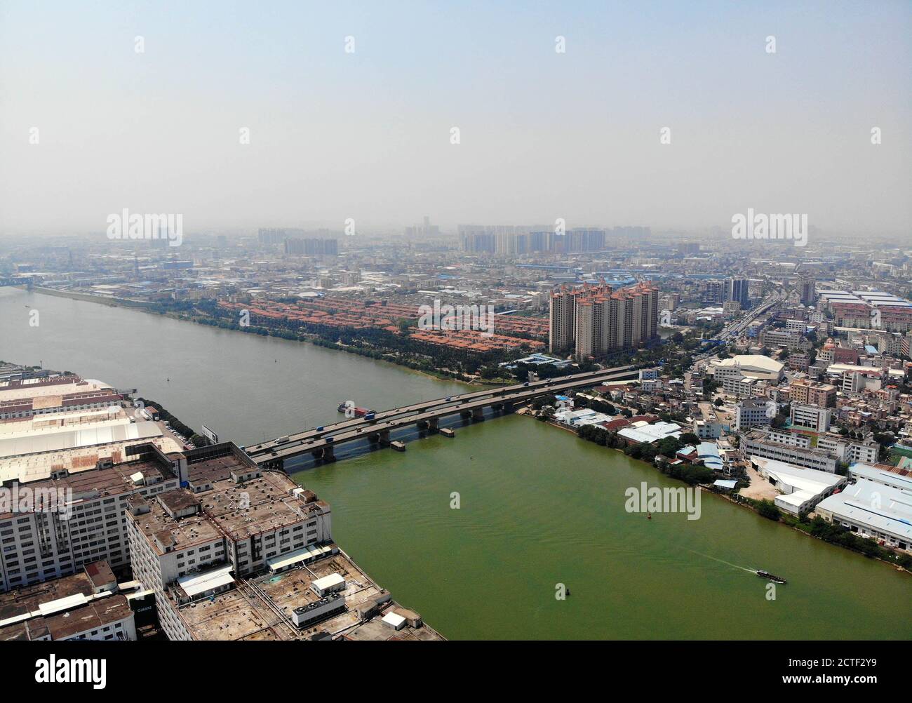 An aerial view of various factories located at a local industrial zone ...