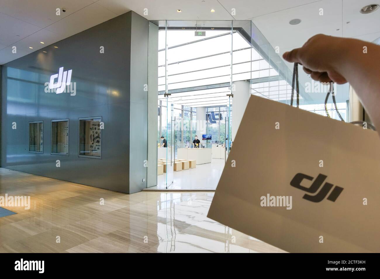 Customers experience products at the newly opened DJI flagship retail store which is the first of its kind in north China established by Shenzhen DJI Sciences and Technologies Ltd. Beijing China 8 Aug...