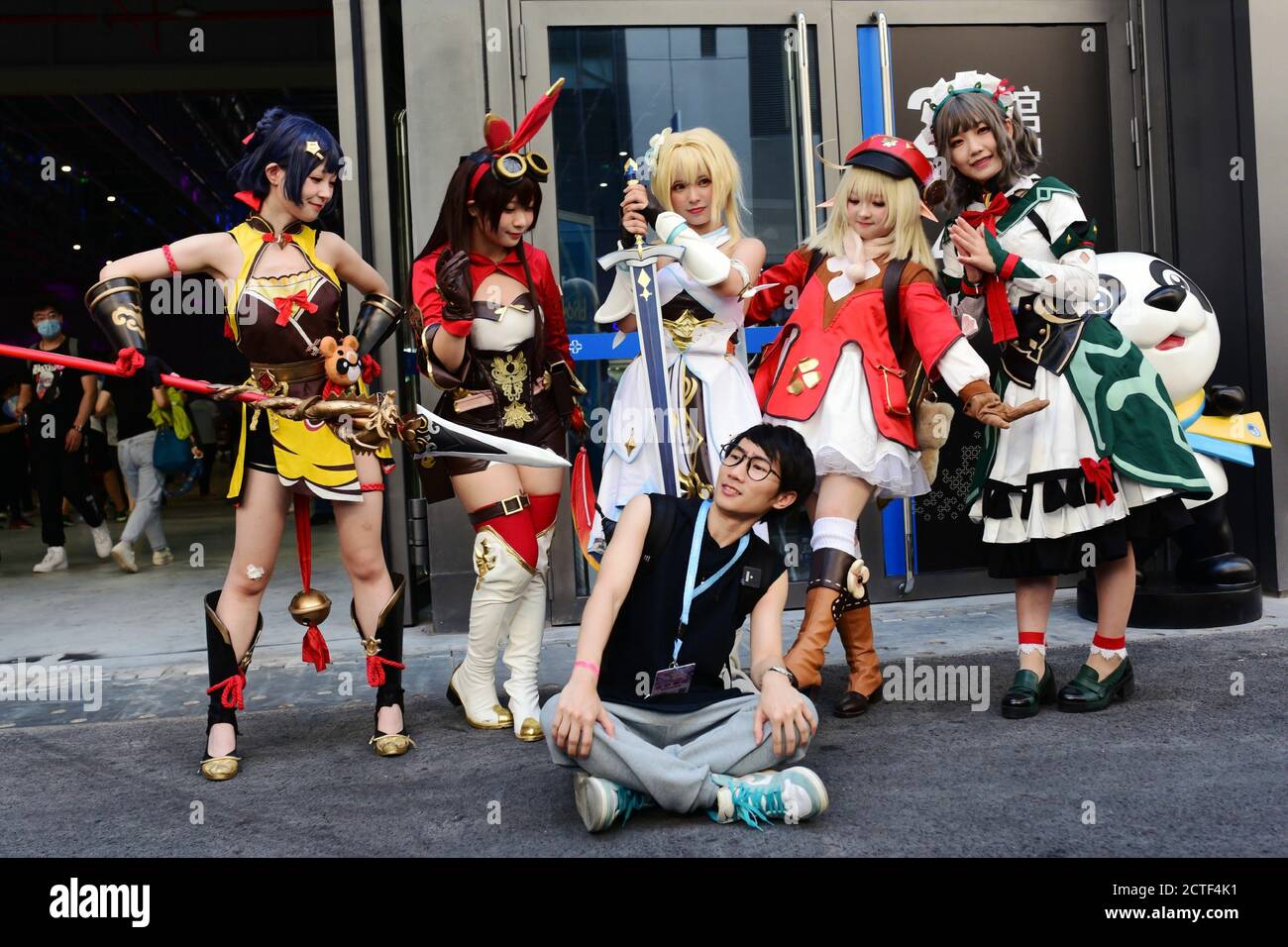 Cosplayers dress up as figures from animations, comics, and games ...