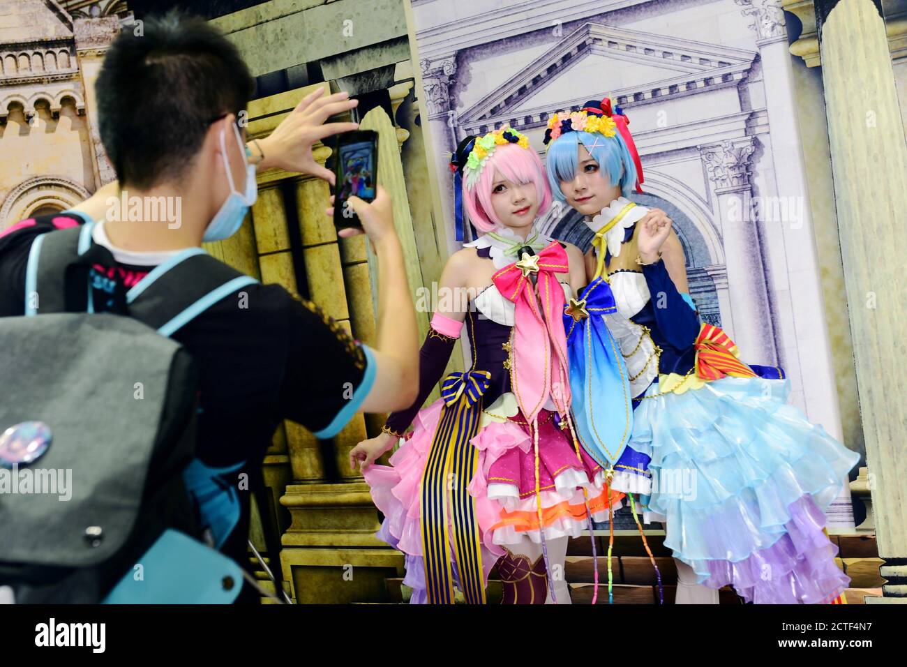 Cosplayers dress up as figures from animations, comics, and games ...