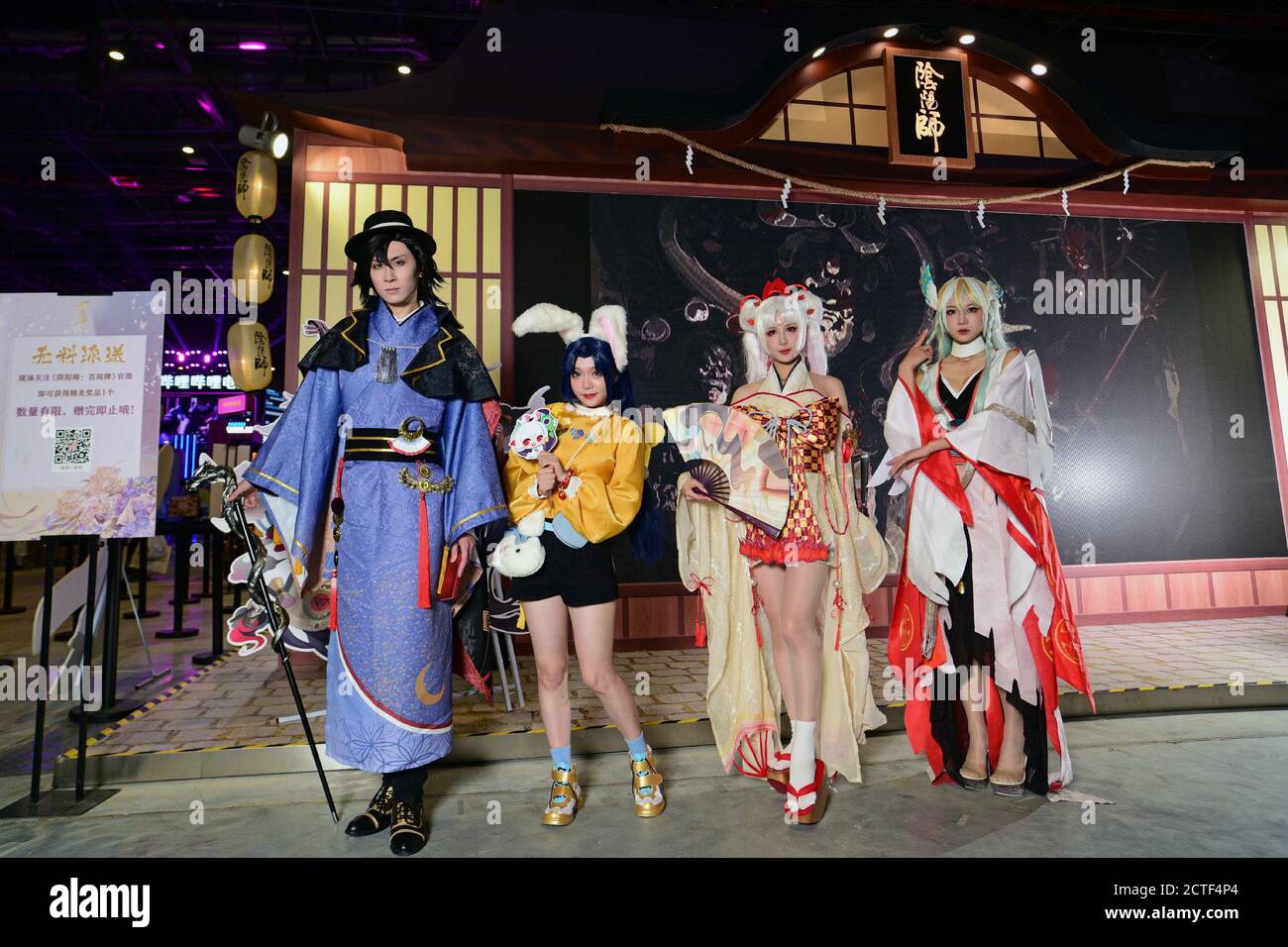 Cosplayers dress up as figures from animations, comics, and games ...
