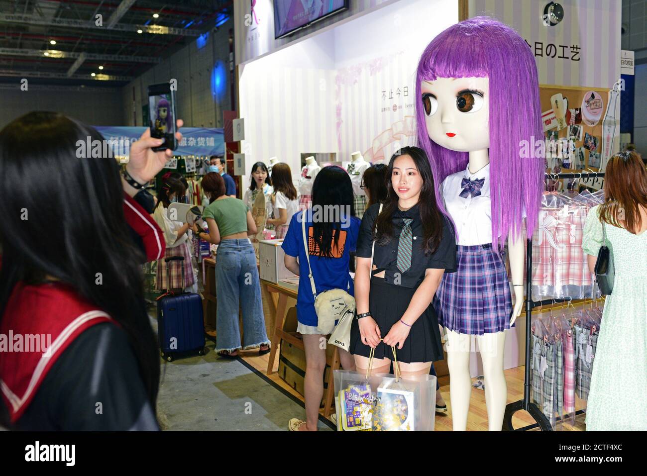 Cosplayers dress up as figures from animations, comics, and games ...