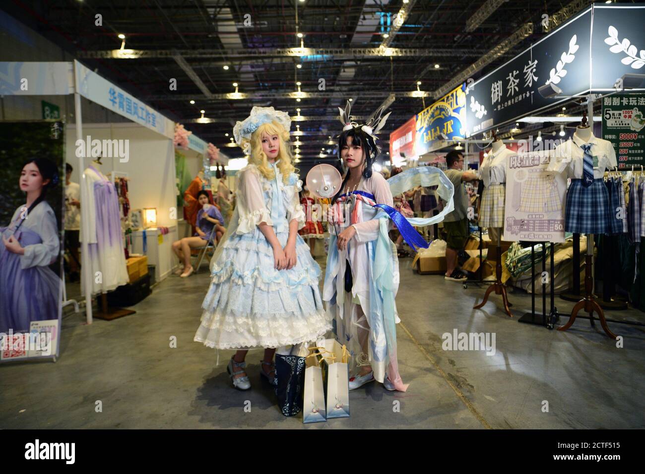Cosplayers dress up as figures from animations, comics, and games ...