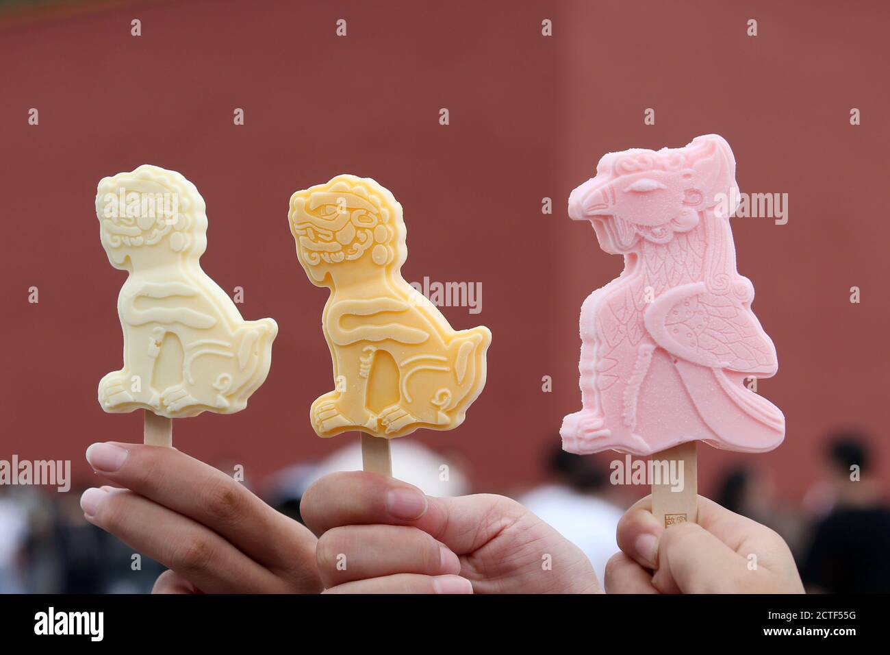 People show the ice-cream whose shapes and creation comes from the ...