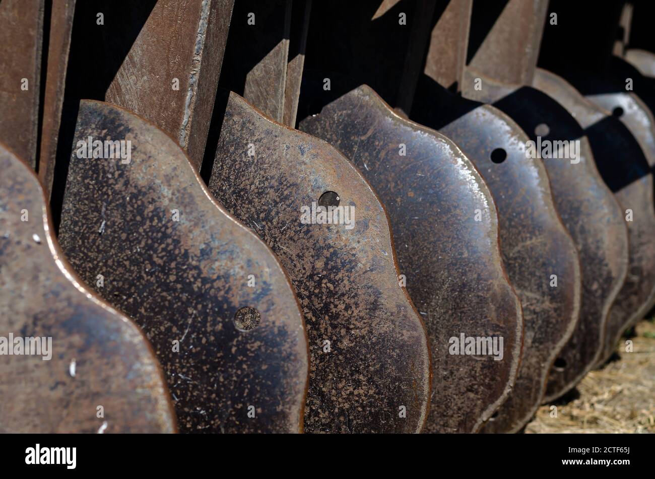 Old rusty disc harrow close up. Plow for plowing the soil. Agricultural ...